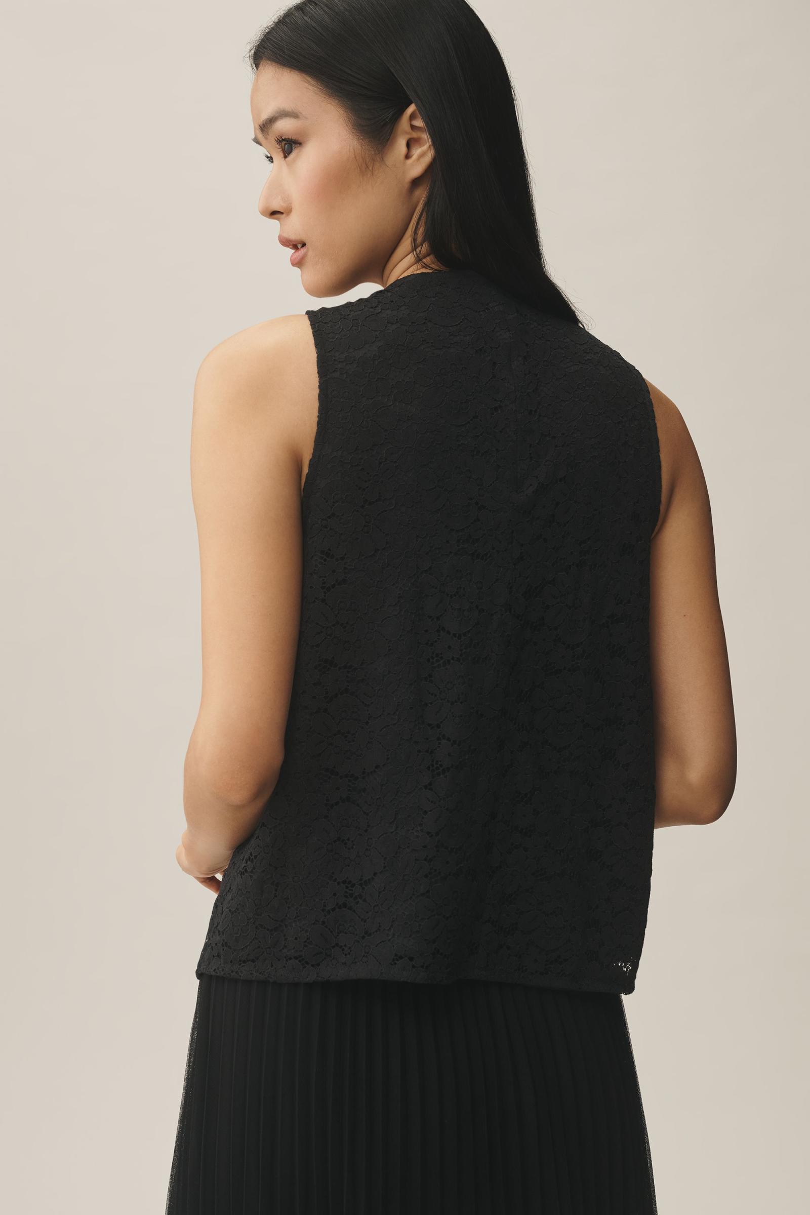 메이브 크리스탈 보우 장식 탱크 앤트로폴로지 한국 공식 스토어 유니크한 여성 패션 및 라이프스타일 편집샵 200개이상의 프리미엄 브랜드 여성 의류 액세서리 홈