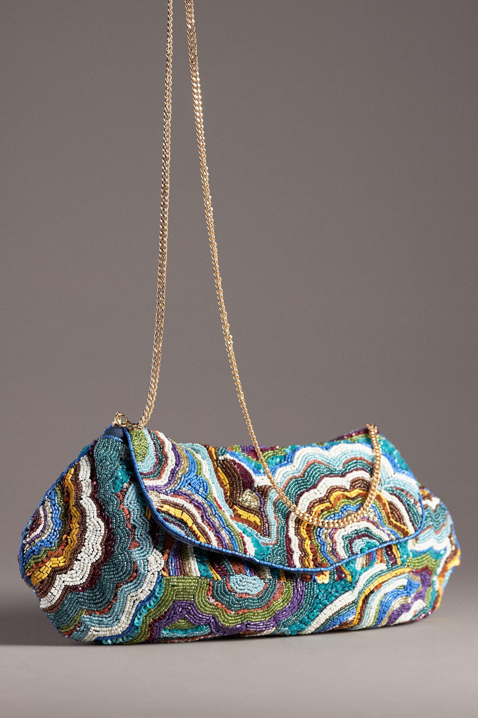 비즈 폴드오버 클러치 앤트로폴로지 한국 공식 스토어 유니크한 여성 패션 및 라이프스타일 편집샵 200개이상의 프리미엄 브랜드 여성 의류 액세서리 홈 인테리어