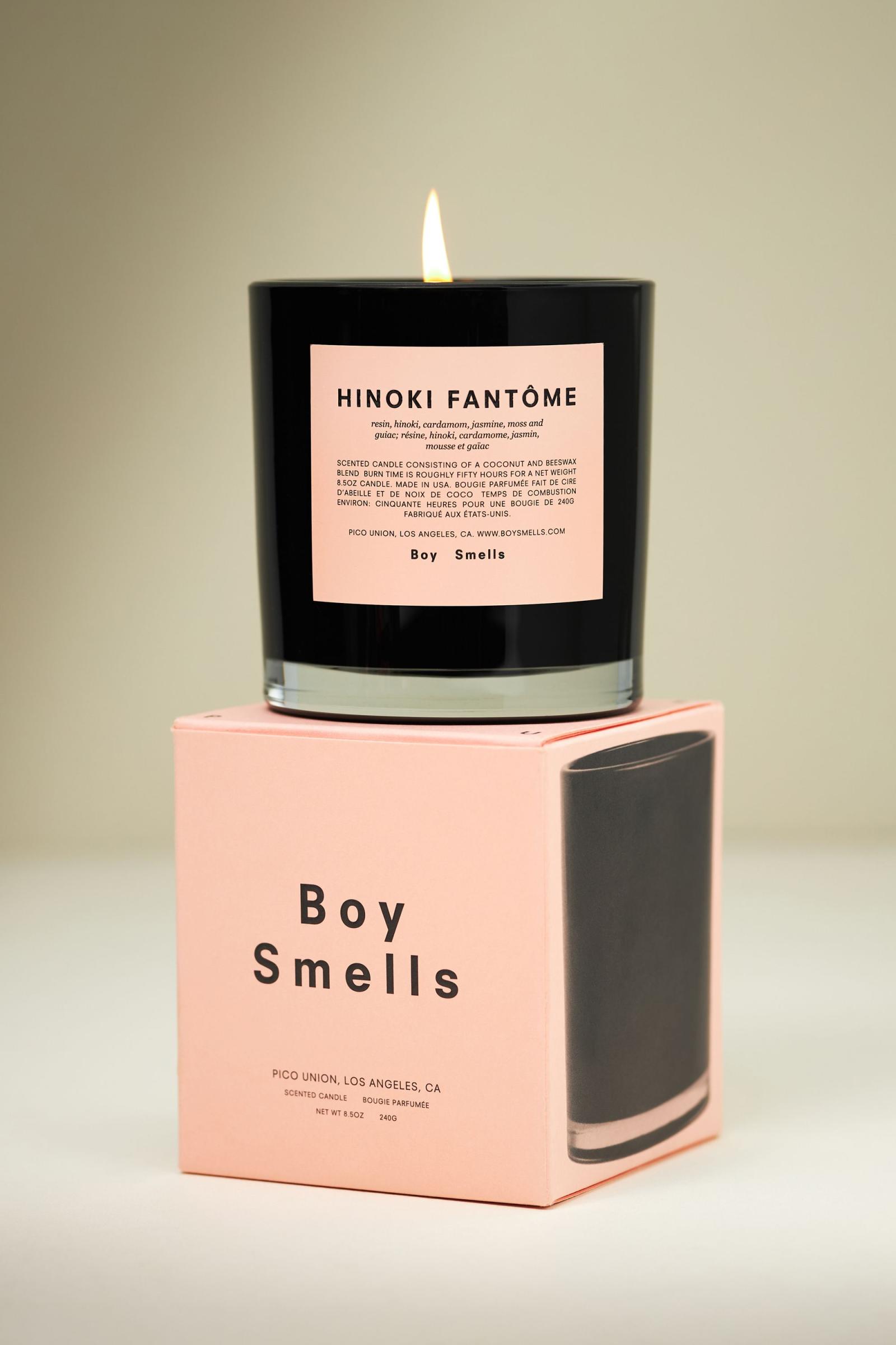 Boy smells candles store