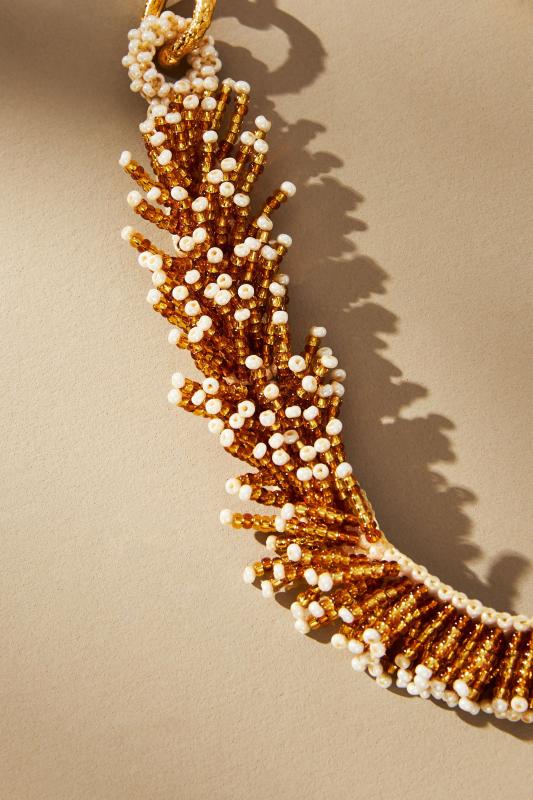 Jetlagmode 산호 목걸이 앤트로폴로지 한국 공식 스토어 유니크한 여성 패션 및 라이프스타일 편집샵 200개이상의 프리미엄 브랜드 여성 의류 액세서리 홈