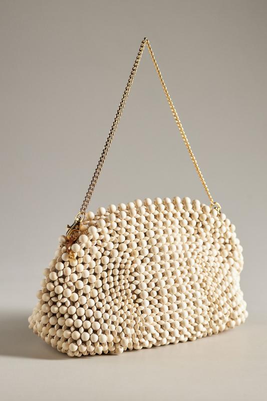 Aranaz 하프 문 클러치 앤트로폴로지 한국 공식 스토어 유니크한 여성 패션 및 라이프스타일 편집샵 200개이상의 프리미엄 브랜드 여성 의류 액세서리 홈