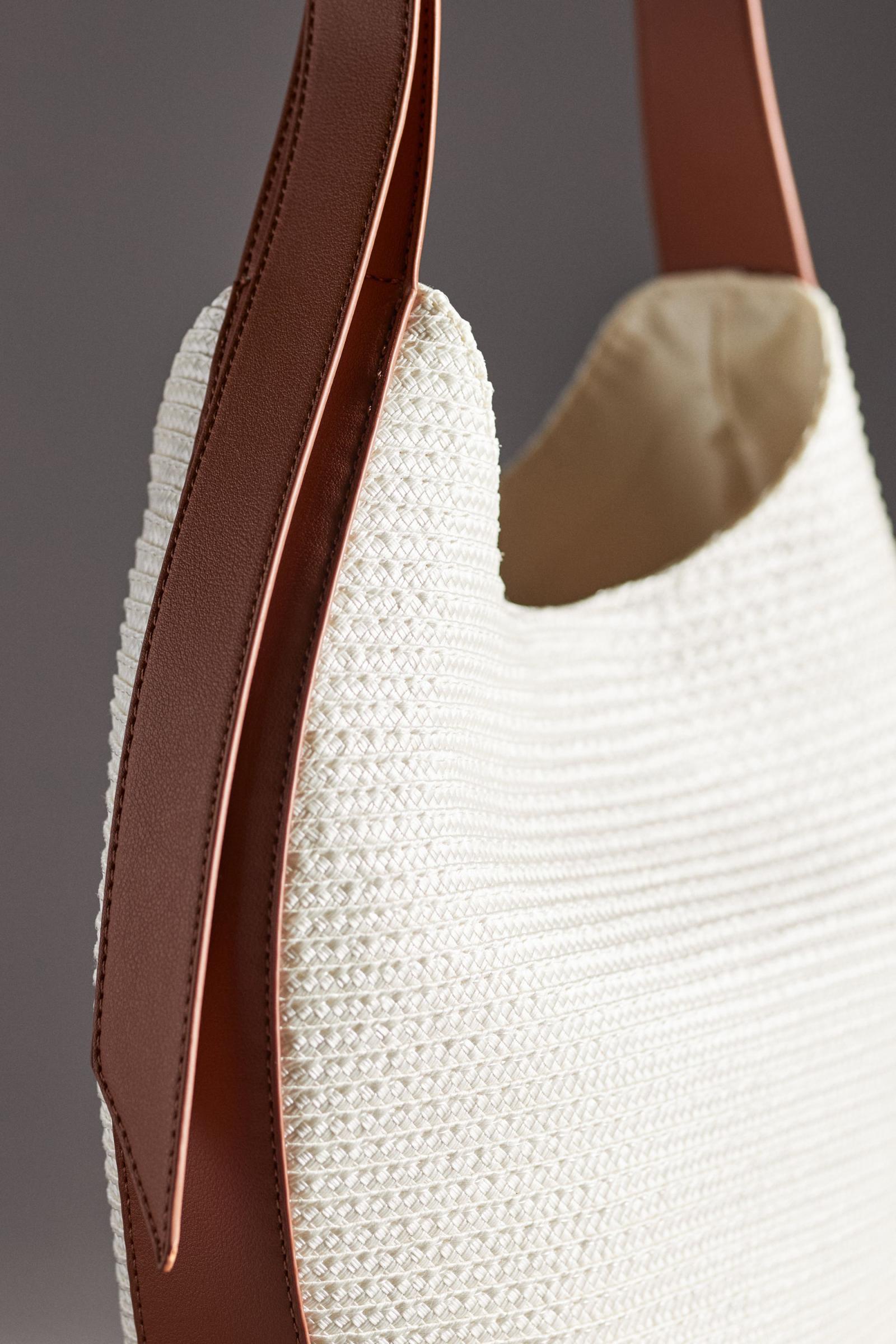 라피아 믹스 버킷 토트 앤트로폴로지 한국 공식 스토어 유니크한 여성 패션 및 라이프스타일 편집샵 200개이상의 프리미엄 브랜드 여성 의류 액세서리 홈 인테리어