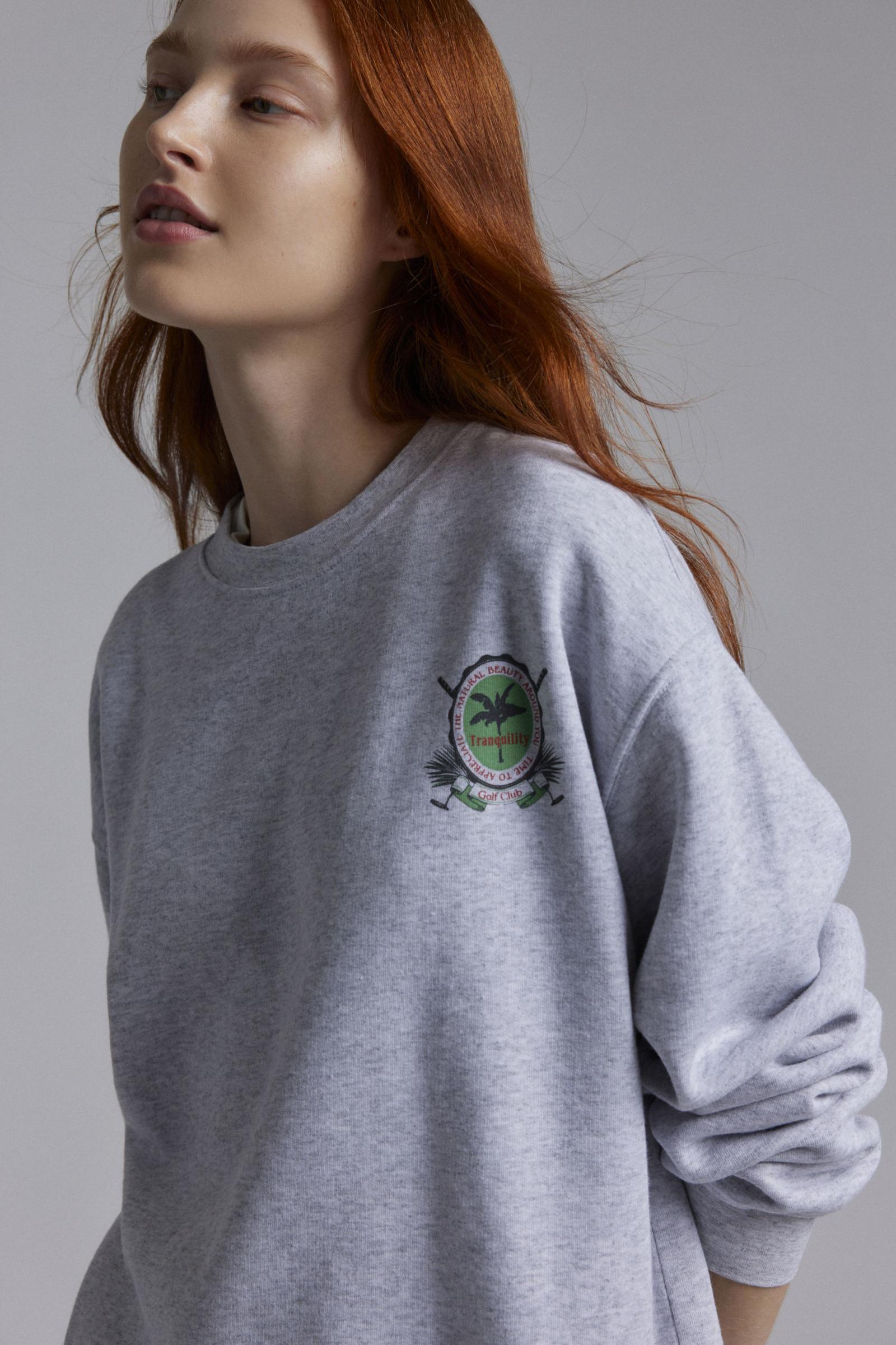 Tranquility Golf Graphic Crew Neck Pullover | Urban Outfitters ...